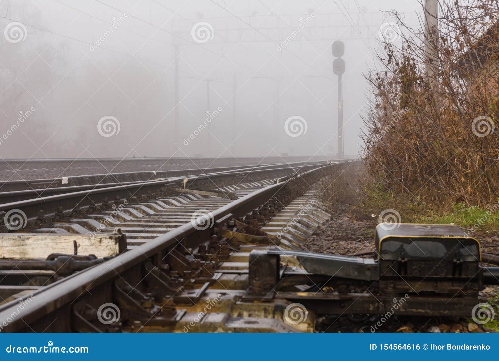 Railroad Tracks in the Fog on Autumn Stock Photo - Image of line, empty ...