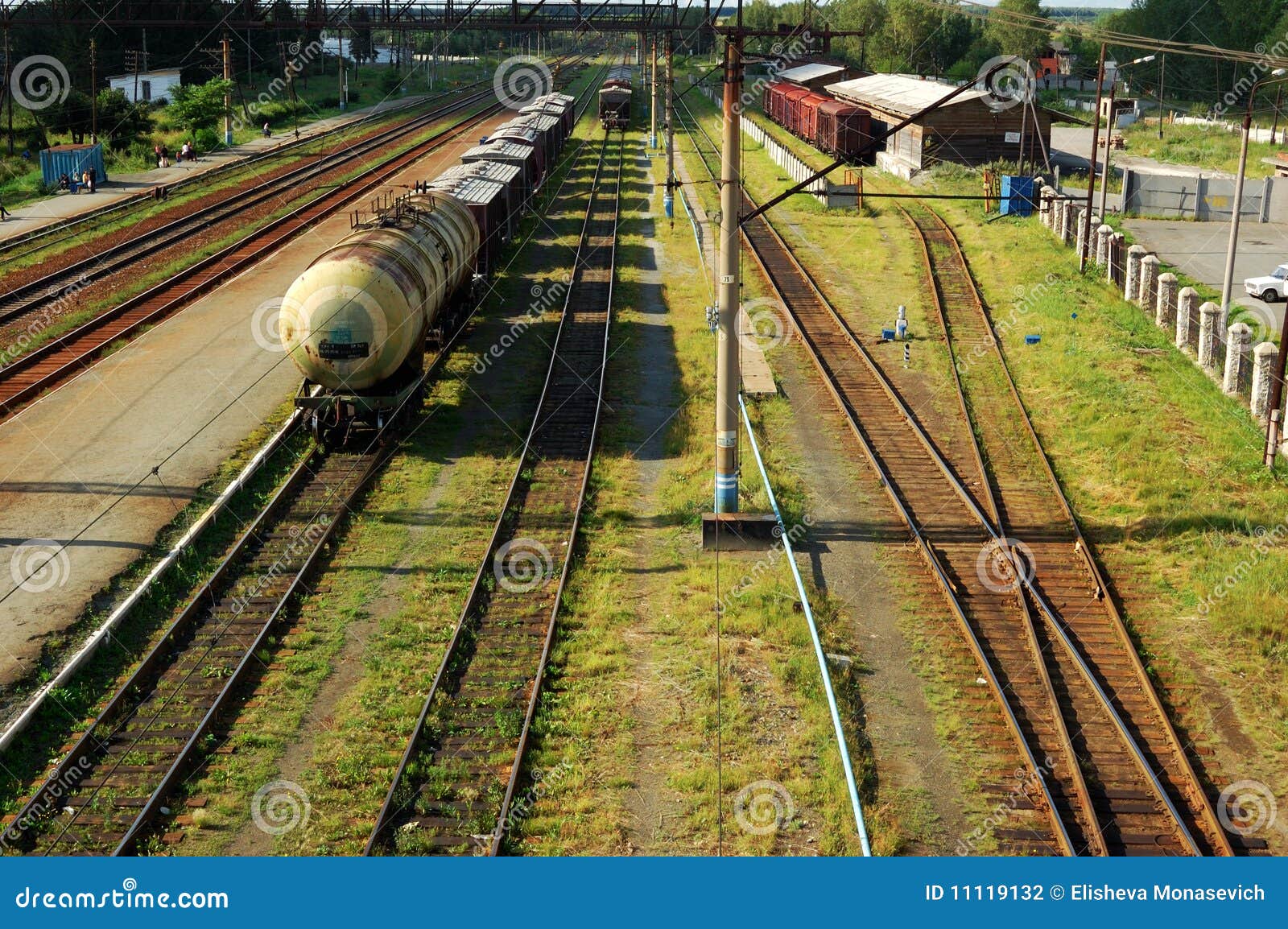 Railroad Tracks and Freight Train Stock Photo - Image of depot, commute ...
