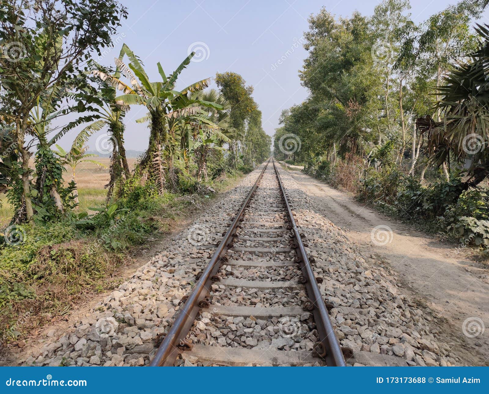 Railroad Tracks in the Middle of Village Stock Photo - Image of ...