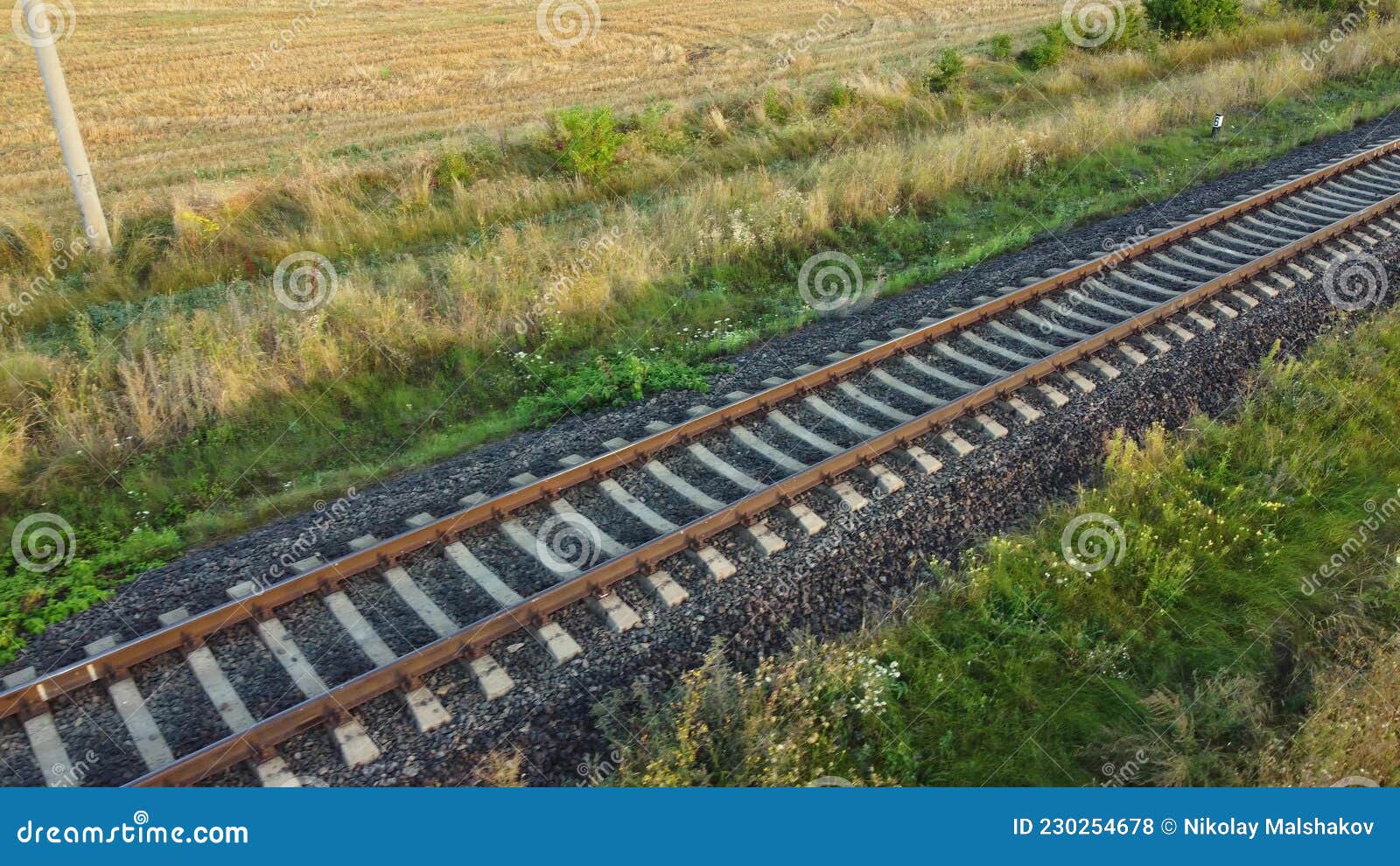 Railroad Tracks, Road for Train Across the Field. Stock Photo - Image ...