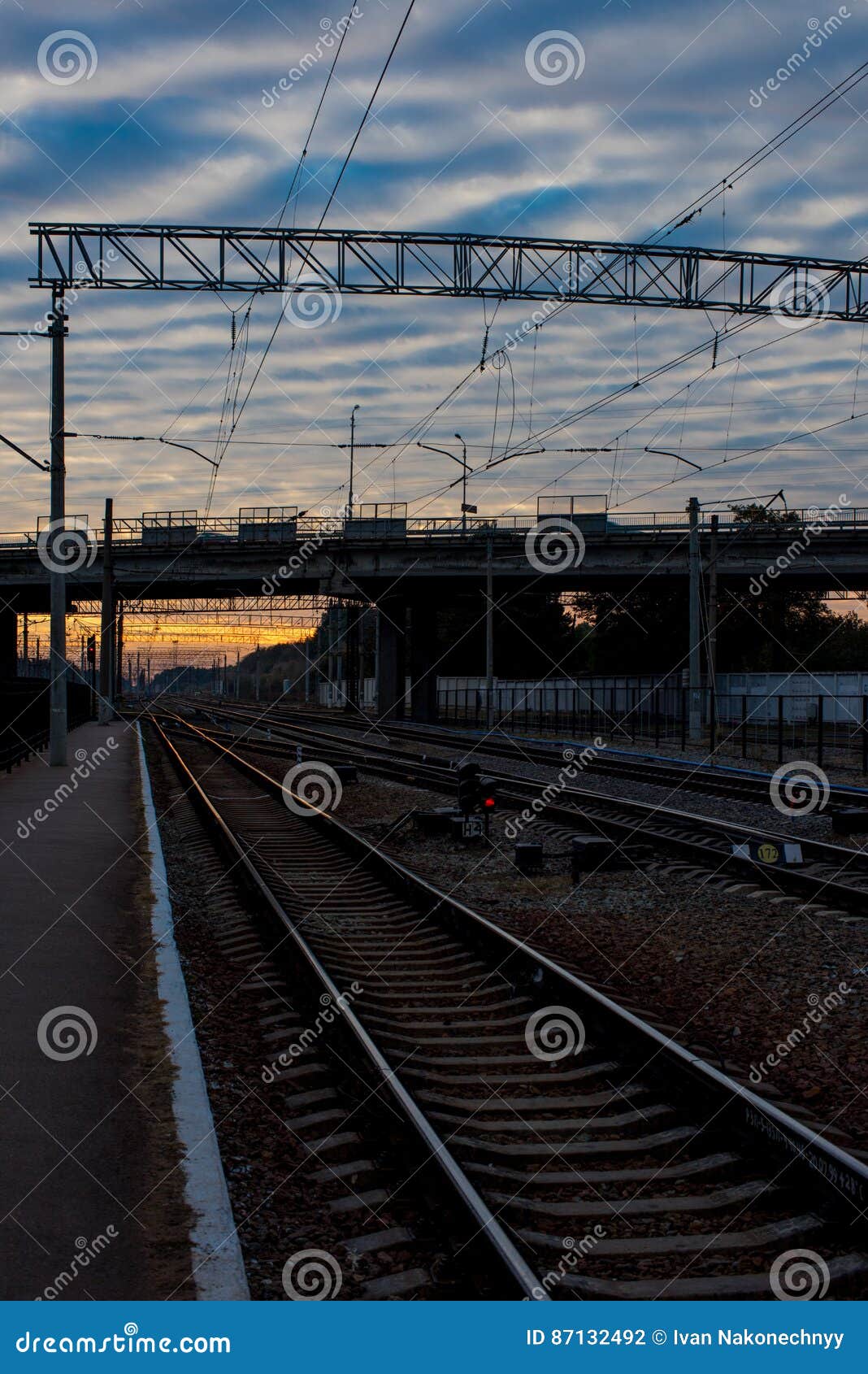 Railroad tracks at sunset stock photo. Image of container - 87132492