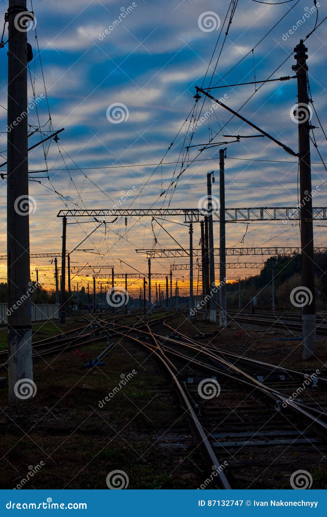 Railroad tracks at sunset stock image. Image of transportation - 87132747