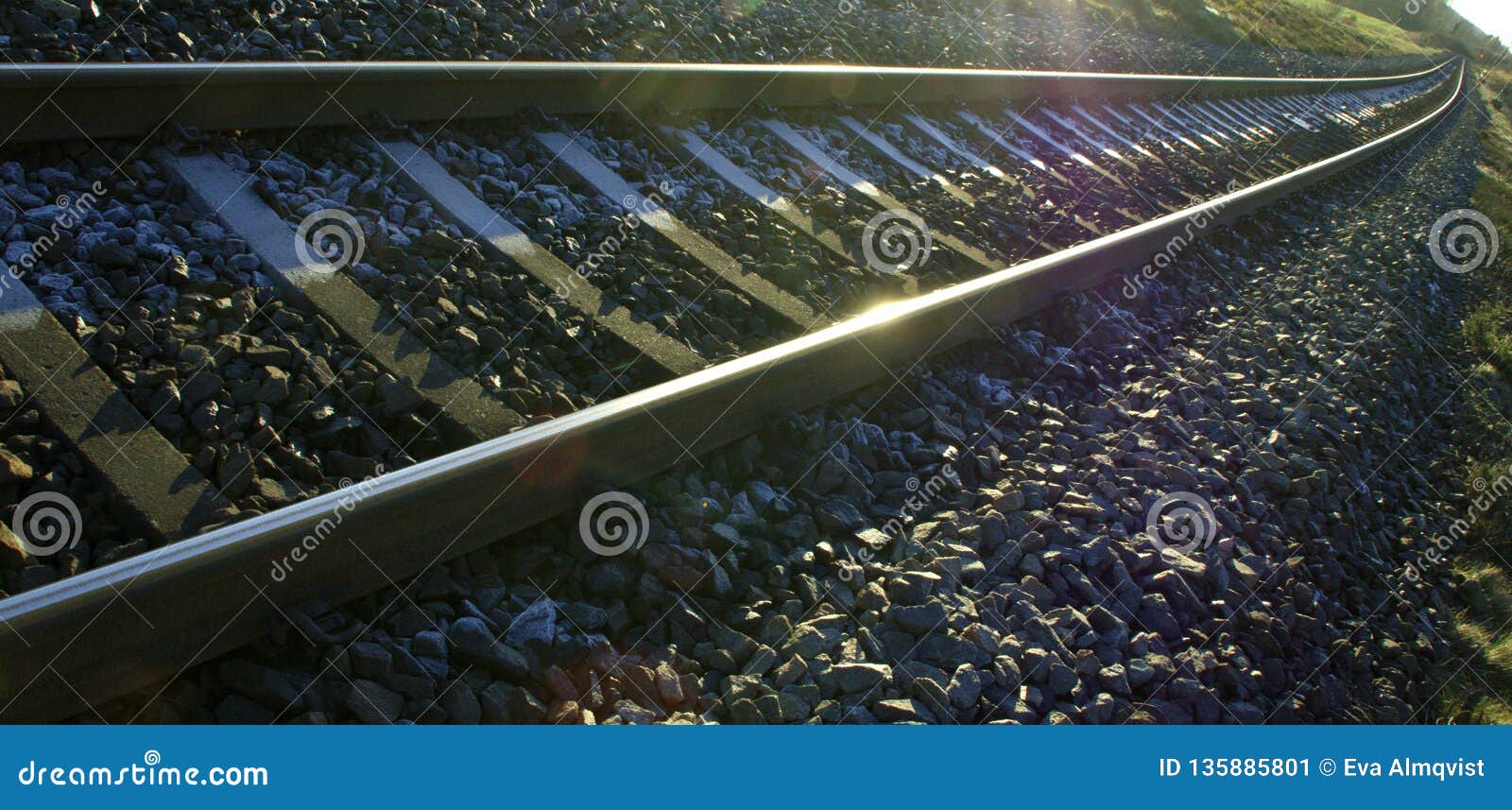 Railroad Tracks in Interesting Long Perspective with Sun Shining from ...