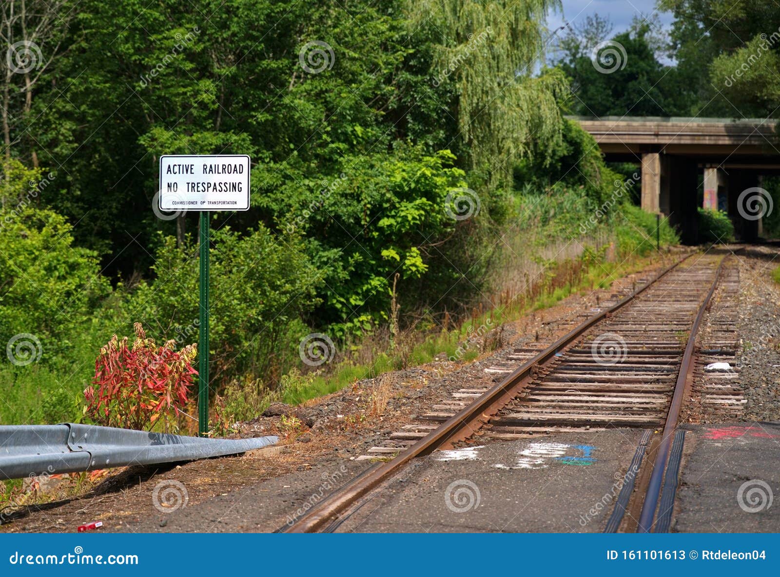 Railroad Tracks Warning Sign Stock Image - Image of overpass, freeway ...
