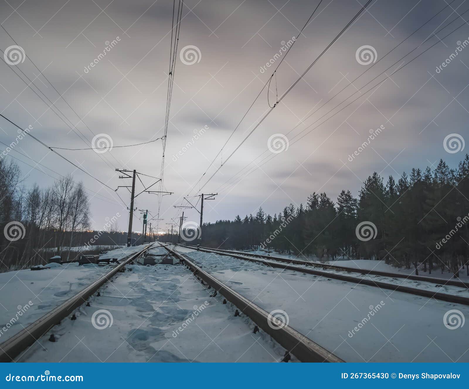 Railroad Tracks on a Winter Night, Railroad Tracks and City Lights in the Background Stock Photo ...