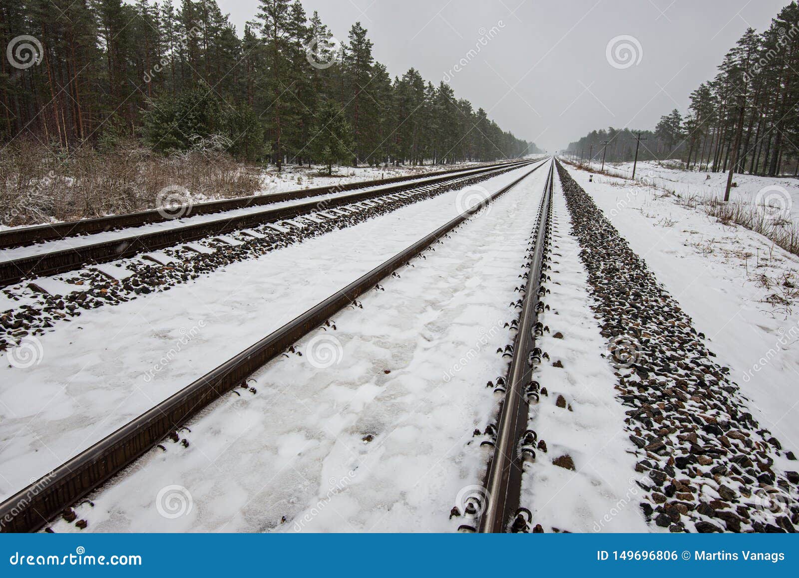 Railroad Tracks in Winter Under Snow Stock Photo - Image of tracks ...