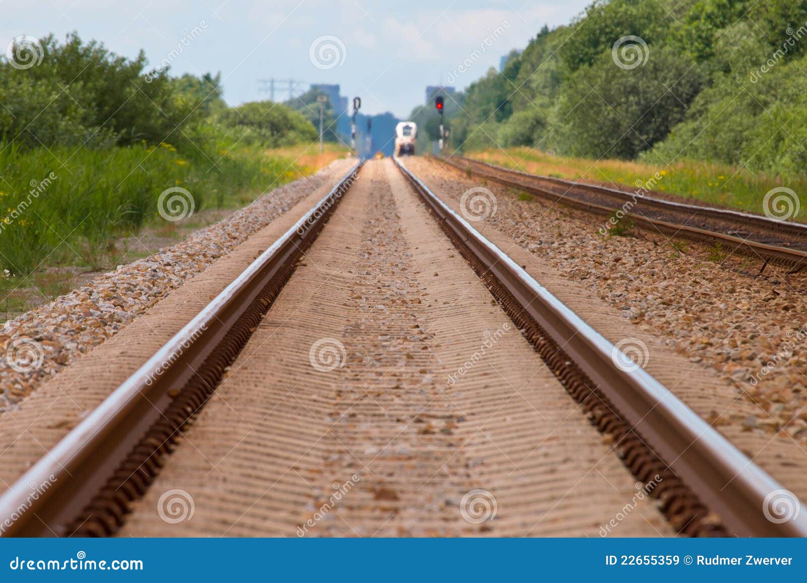 Railroad with Train in the Distance Stock Image - Image of journey ...