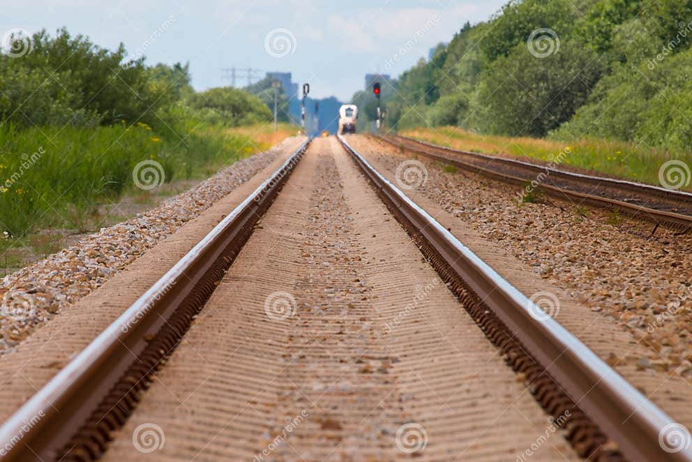 Railroad with Train in the Distance Stock Image - Image of journey ...