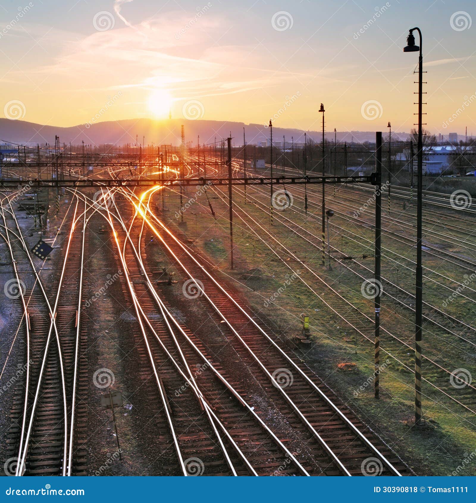 Railroad with Train at Sunset and Many Lines Stock Photo - Image of ...