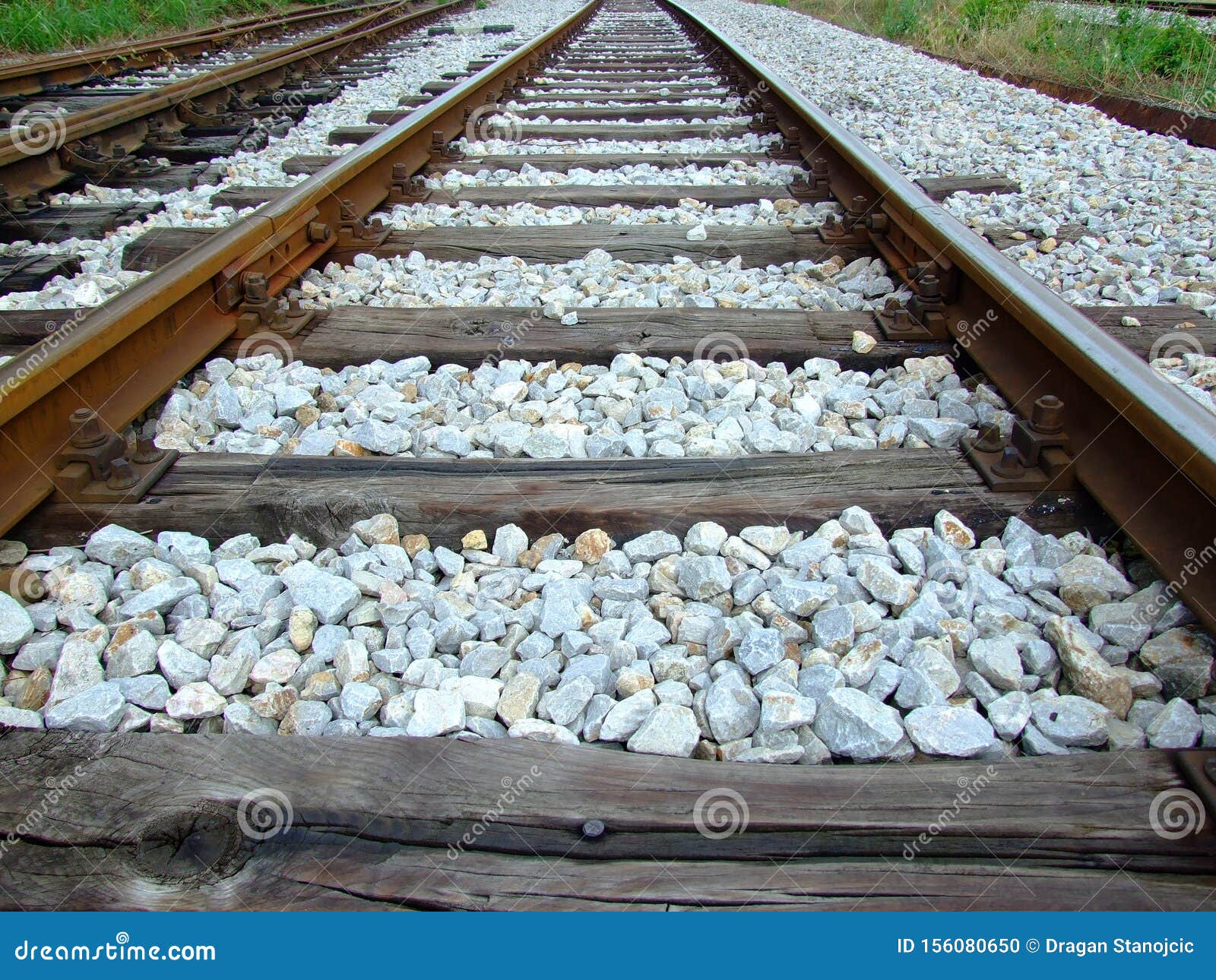 Railroad Tracks with Old Wooden Threshold. Stock Photo - Image of ...