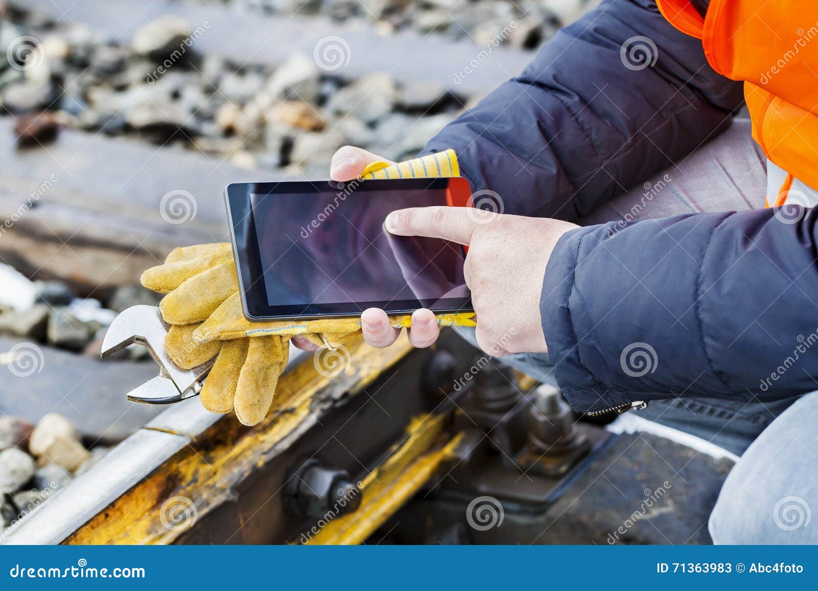 Railroad Worker Using Tablet PC on Railway Stock Image - Image of vest ...