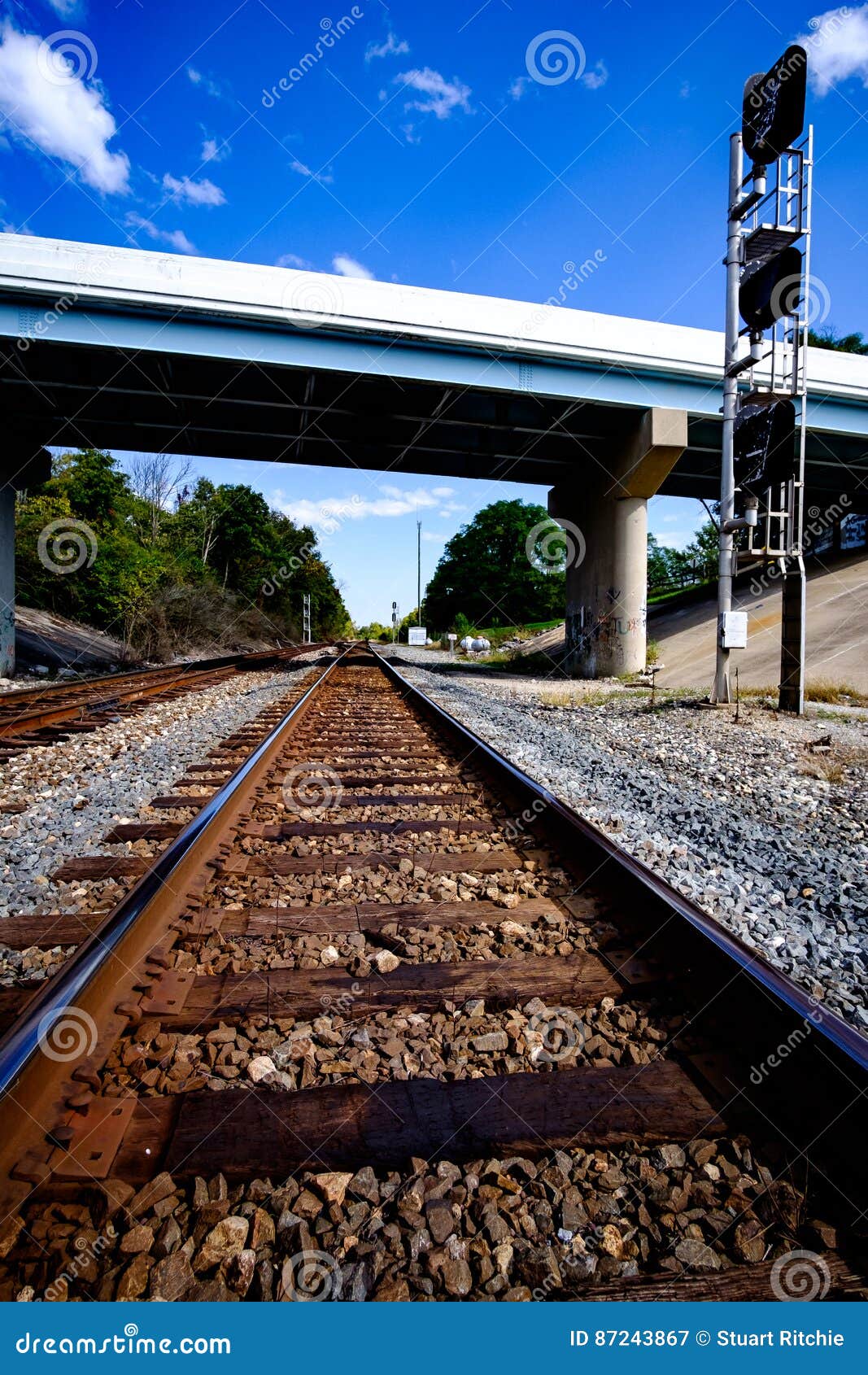 Rails passing under bridge stock image. Image of rails - 87243867