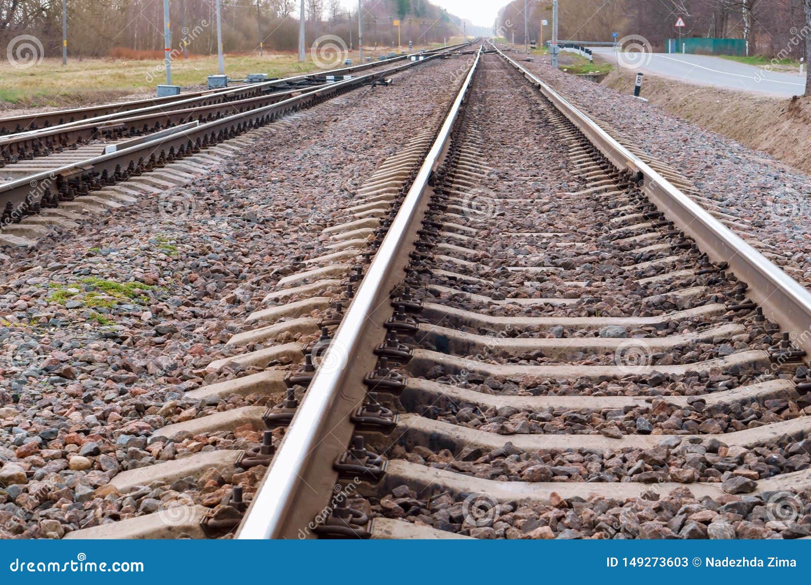 Rails in Three Rows, Railway Stretching into the Distance Stock Image ...
