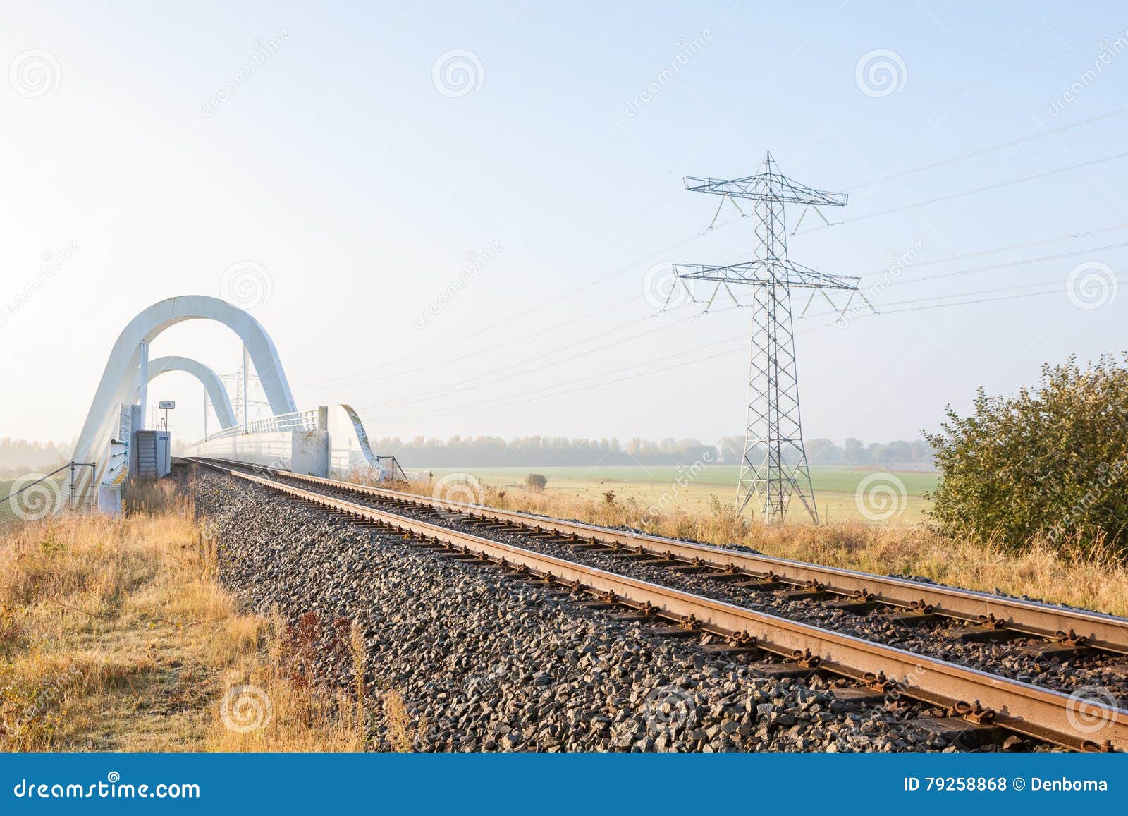 Railway along the field stock photo. Image of meadow - 79258868