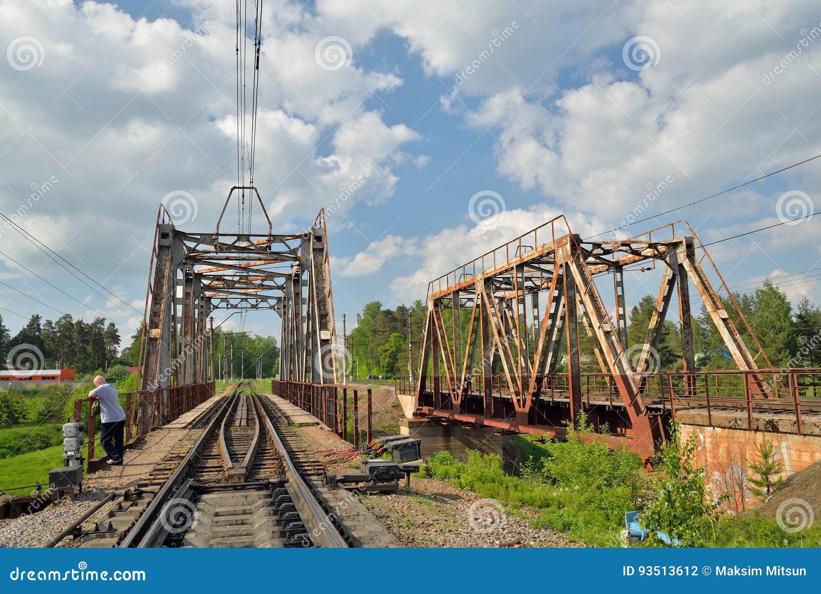 Railway Bridge Across the River and the Rails with the Arrow in ...
