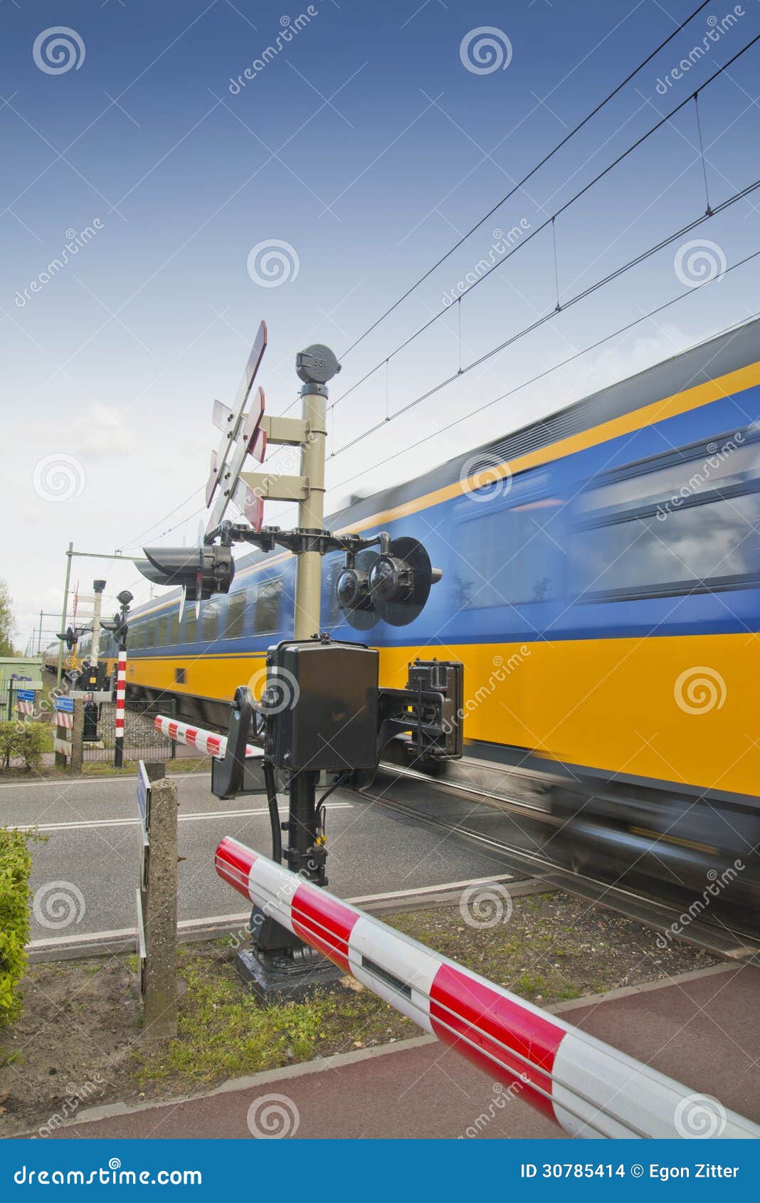 Railway crossing stock photo. Image of moving, fast, blue - 30785414