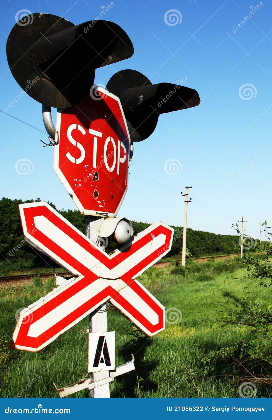 Railway crossing stop sign stock photo. Image of paint - 21056322