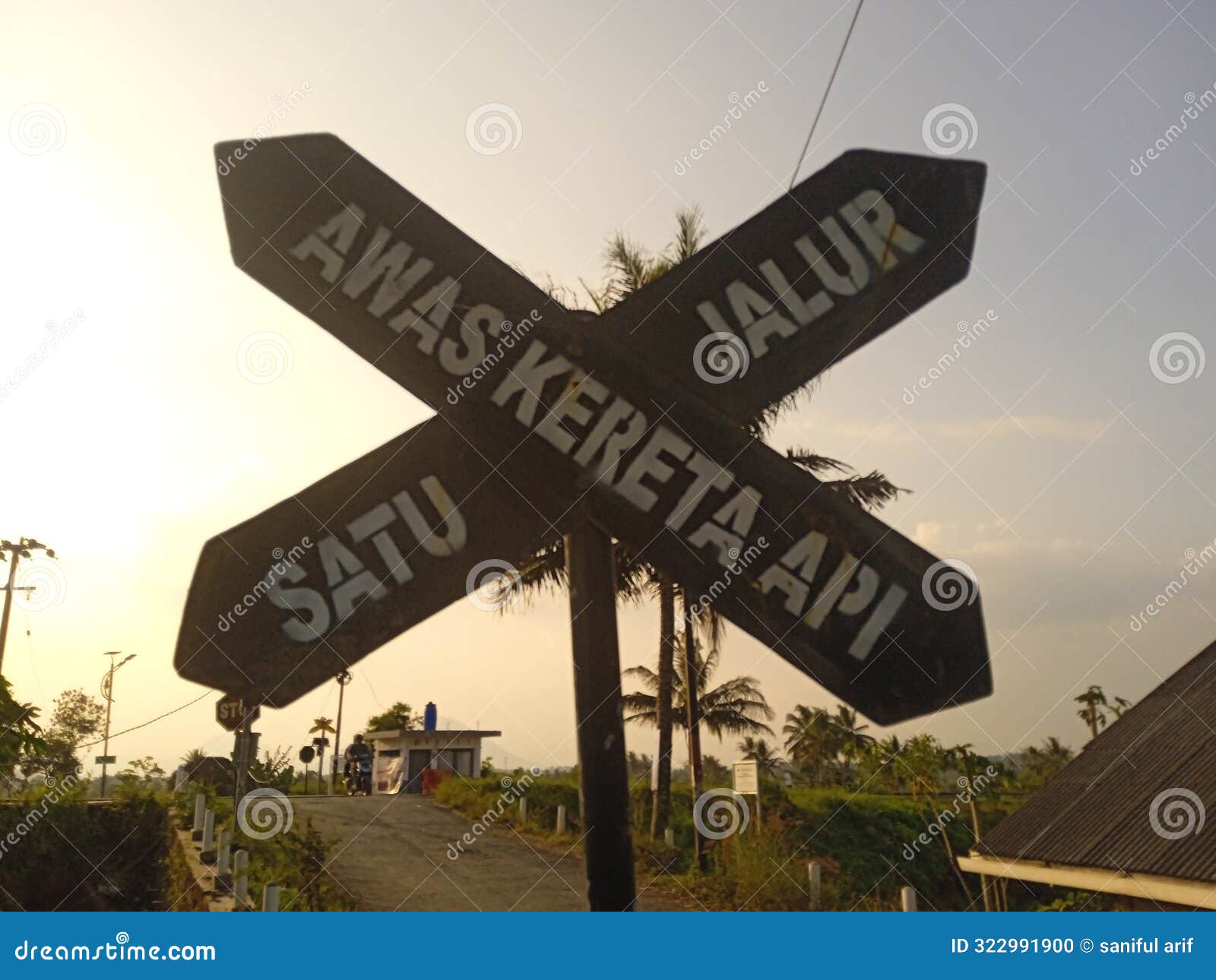 Railway Crossing Warning Sign Stock Photo - Image of signpost, warning ...