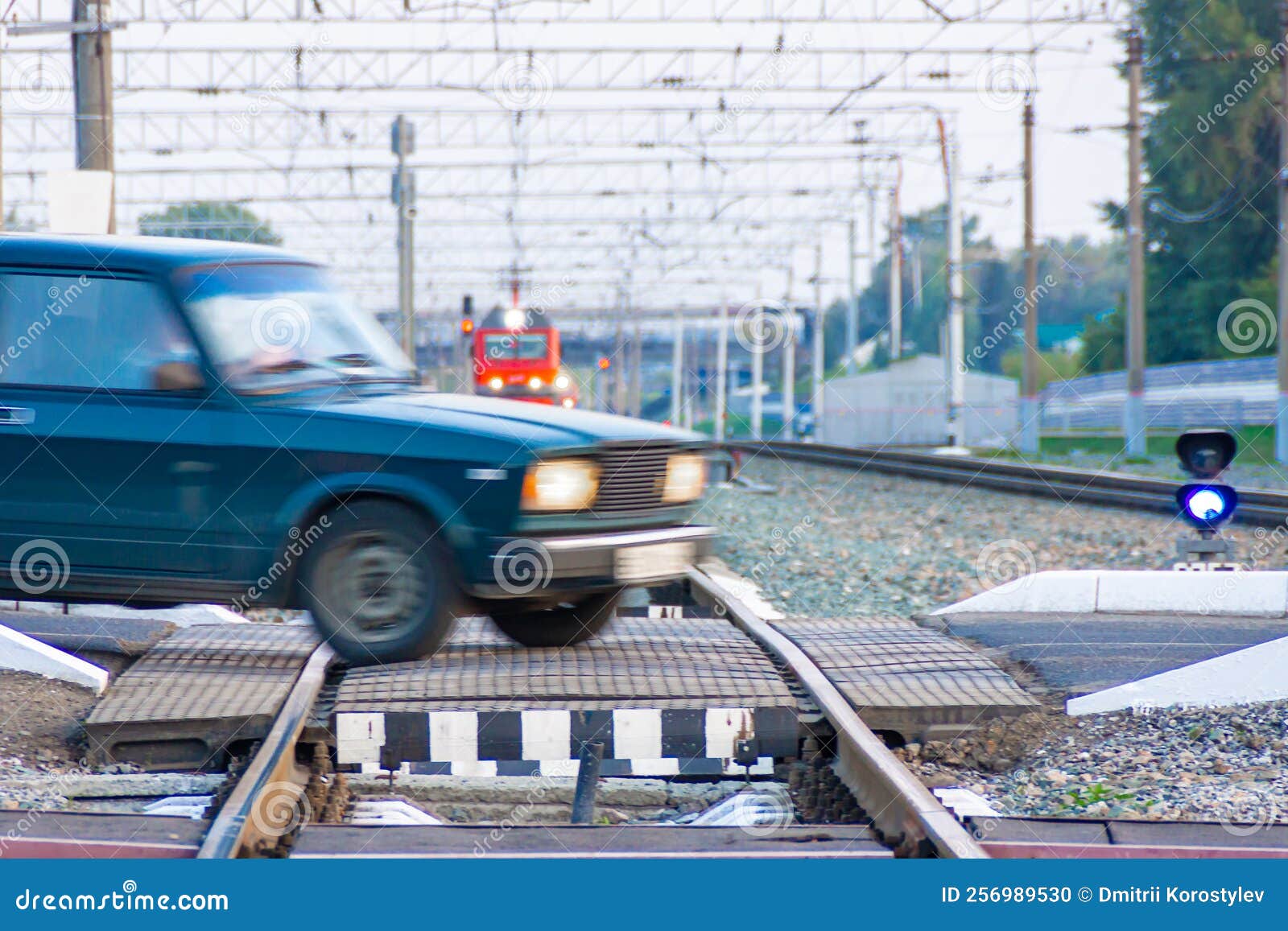 Railway Crossing through Which an Old Passenger Car Passes while ...