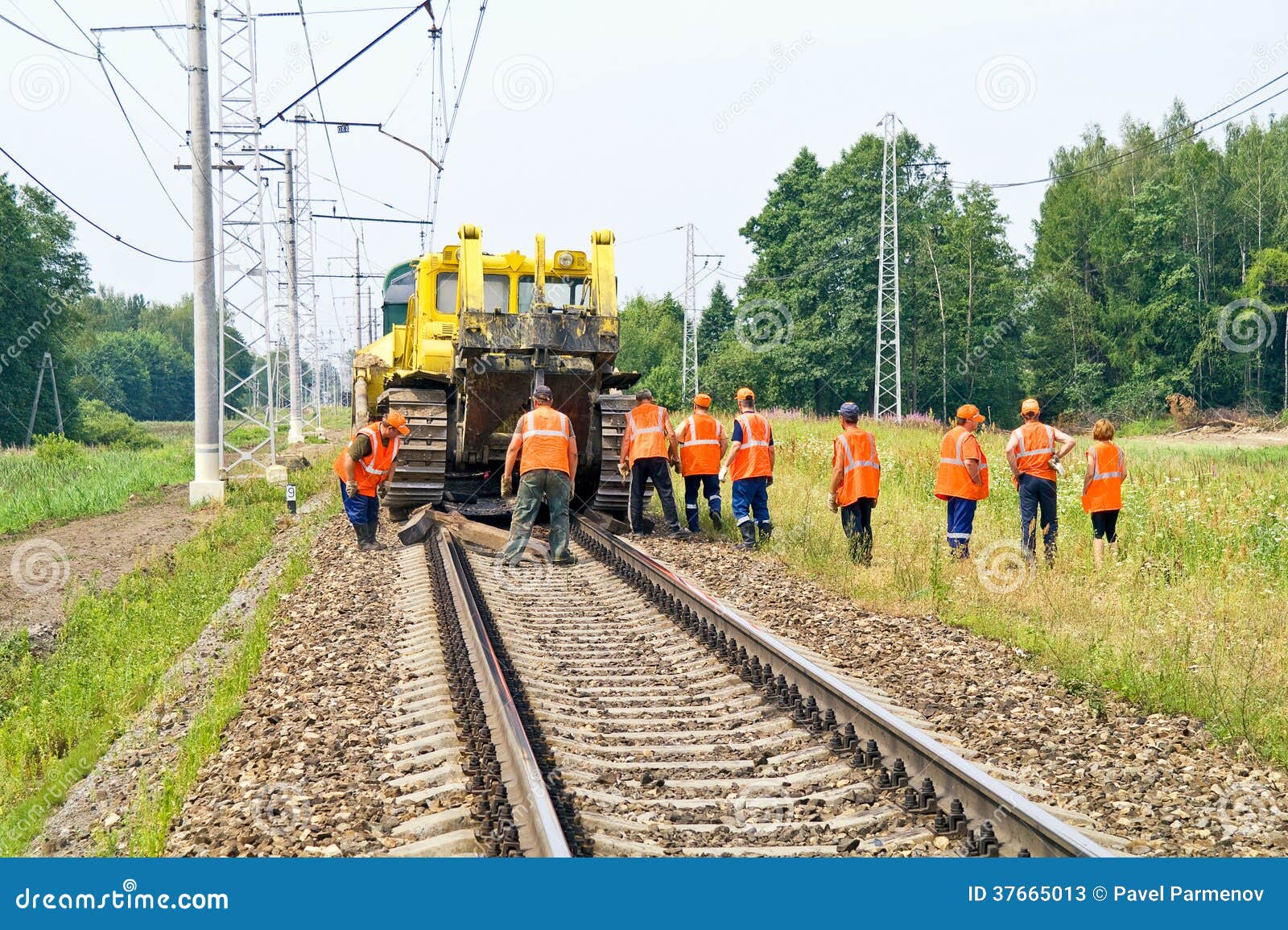 Railway Engineers. Unloading of Tractor from a Freight Platform ...