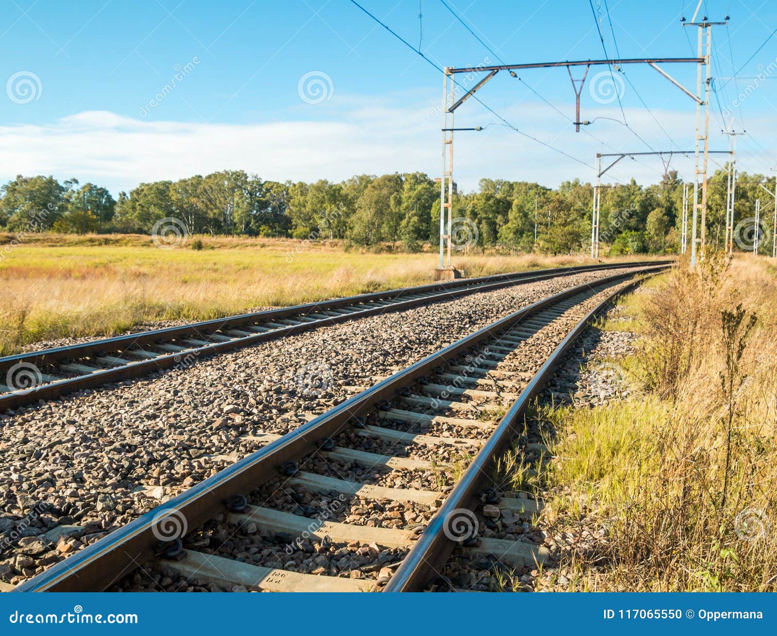Electric Railway Lines Going through a Rural Landscape Stock Photo ...