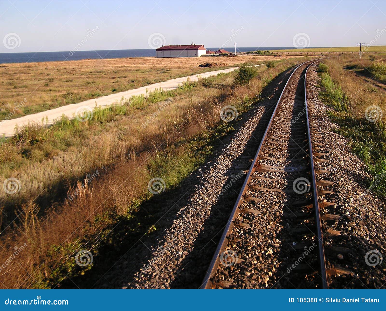 Railway on the sea shore stock photo. Image of tracks, trains - 105380