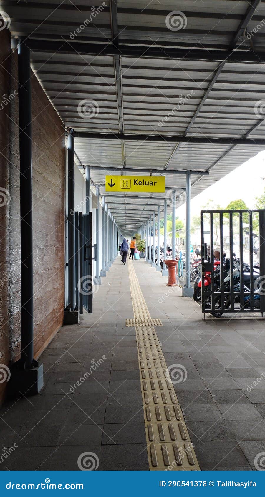 Railway station exit road editorial stock photo. Image of exit - 290541378