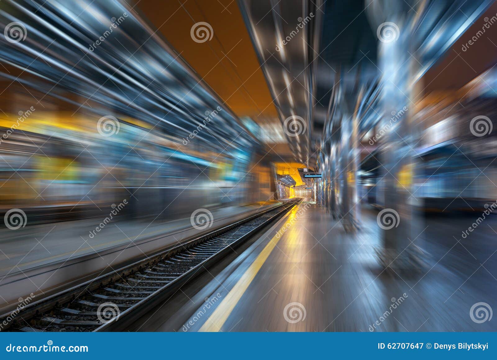 Railway Station at Night with Motion Blur Effect. Railroad Stock Image ...
