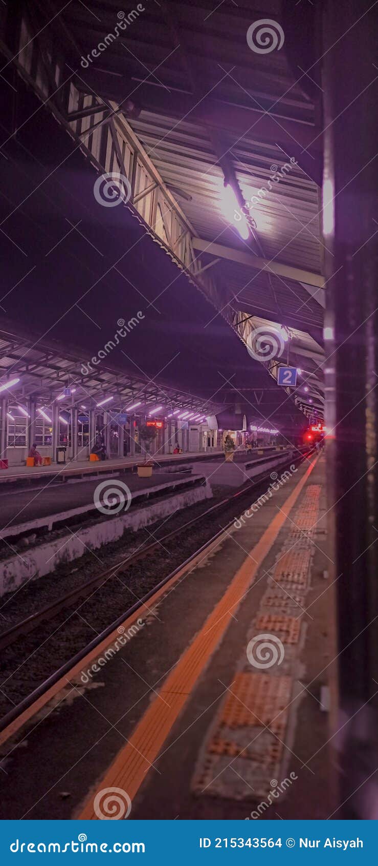 Railway station at night stock photo. Image of light - 215343564