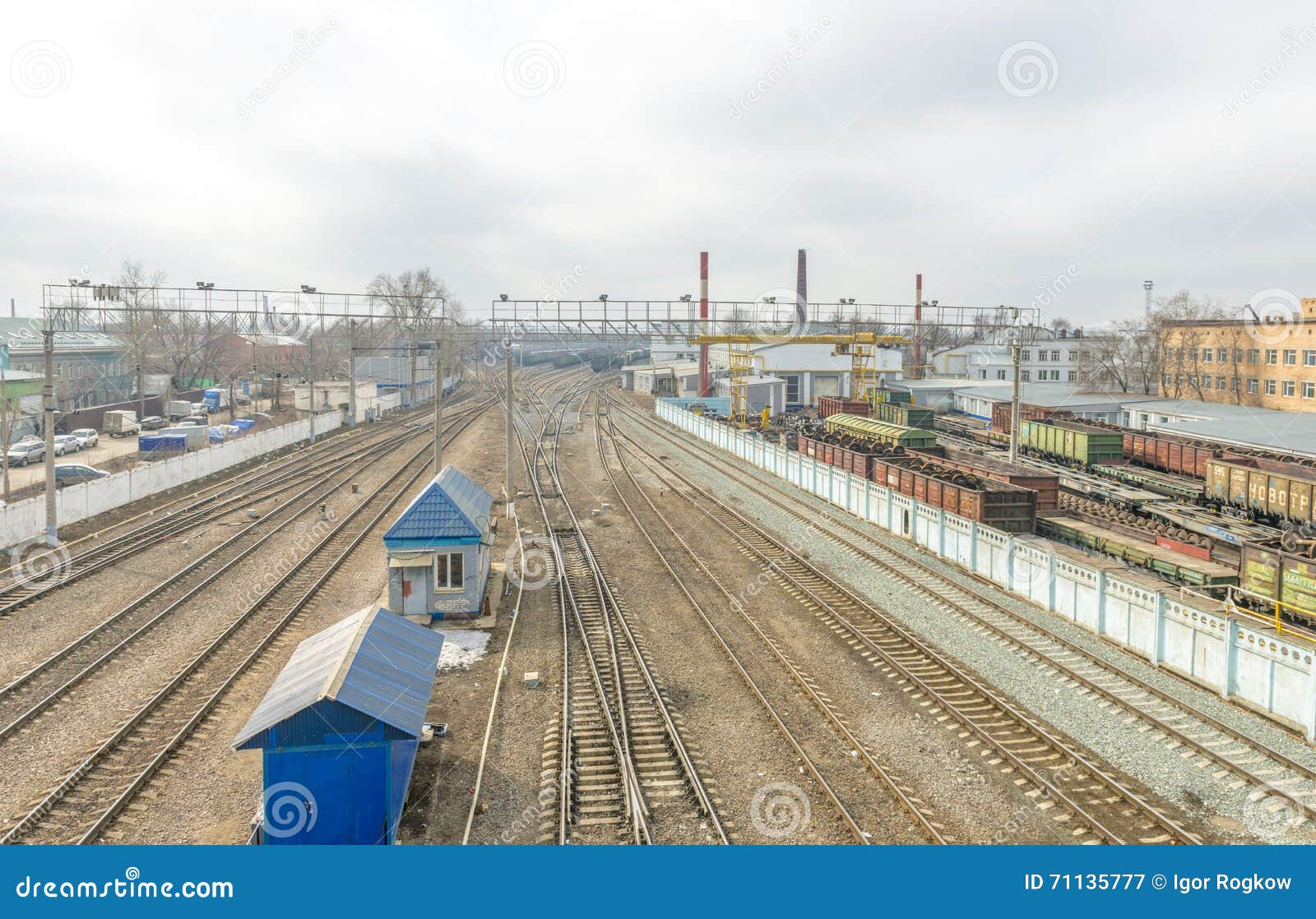 Railway Station in Russia and Freight and Passenger Trains Editorial ...