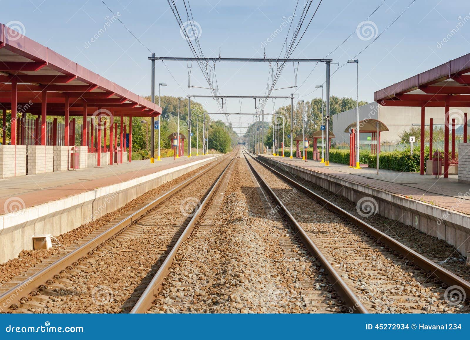 Railway Station with Two Tracks and Electric Power. Stock Photo - Image ...