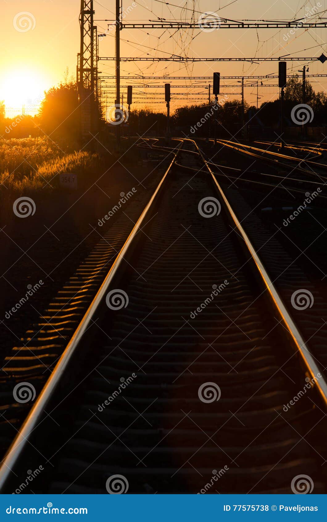 Railway in sunset stock photo. Image of railroad, travel - 77575738