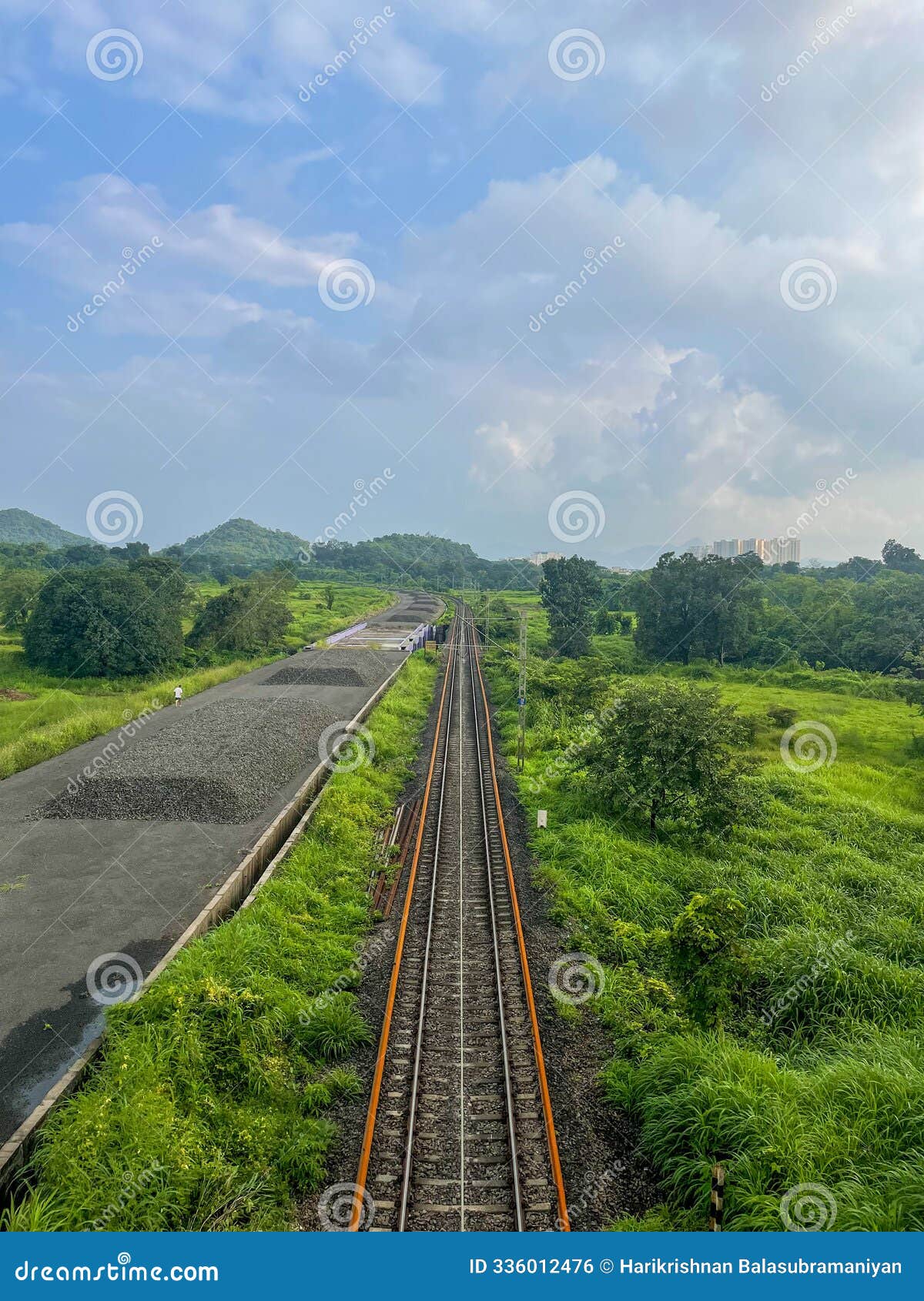 Railway Track with Grass, Mountain and Cloud Stock Photo - Image of ...