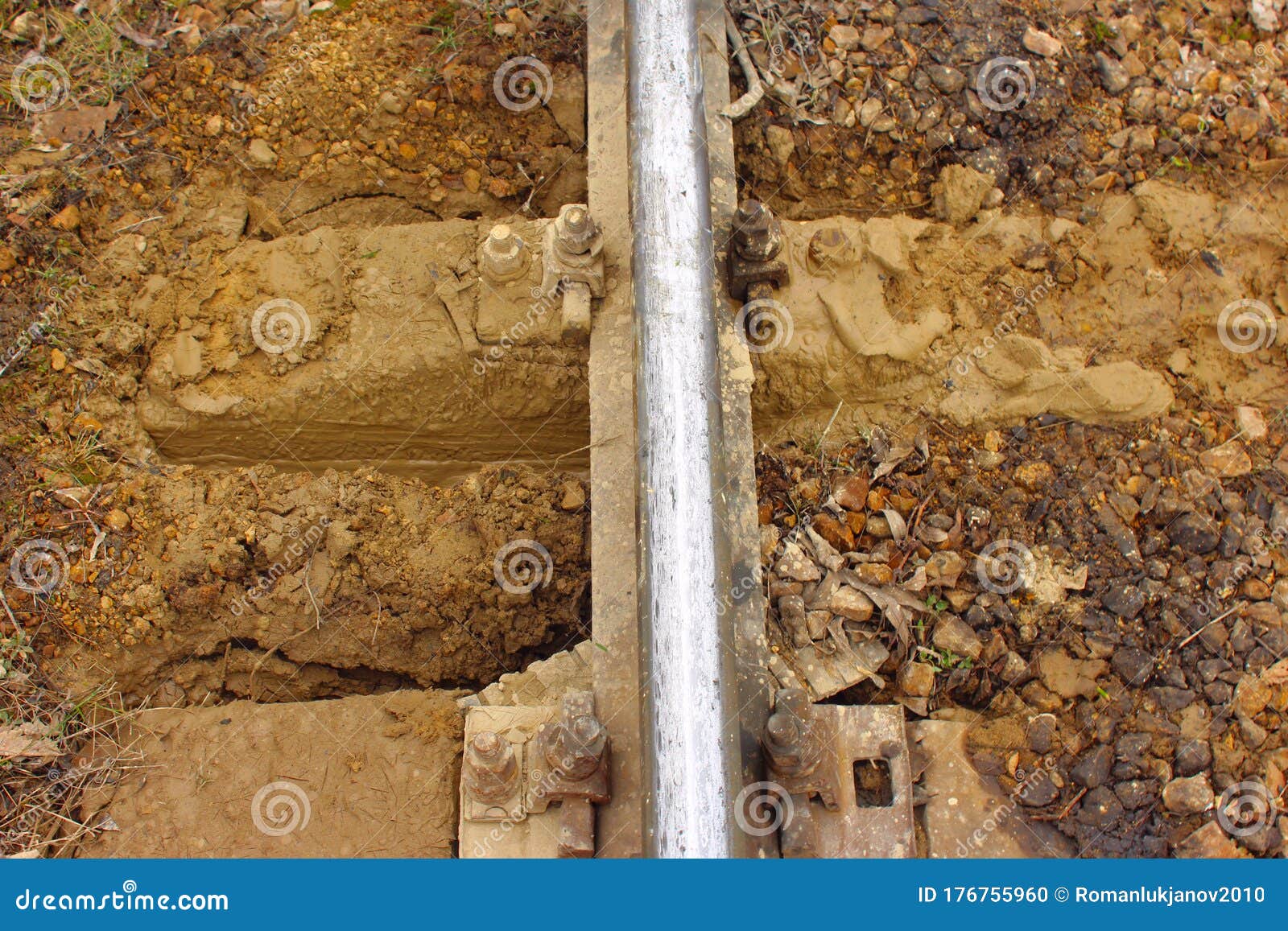 Railway track in the mud stock photo. Image of path - 176755960