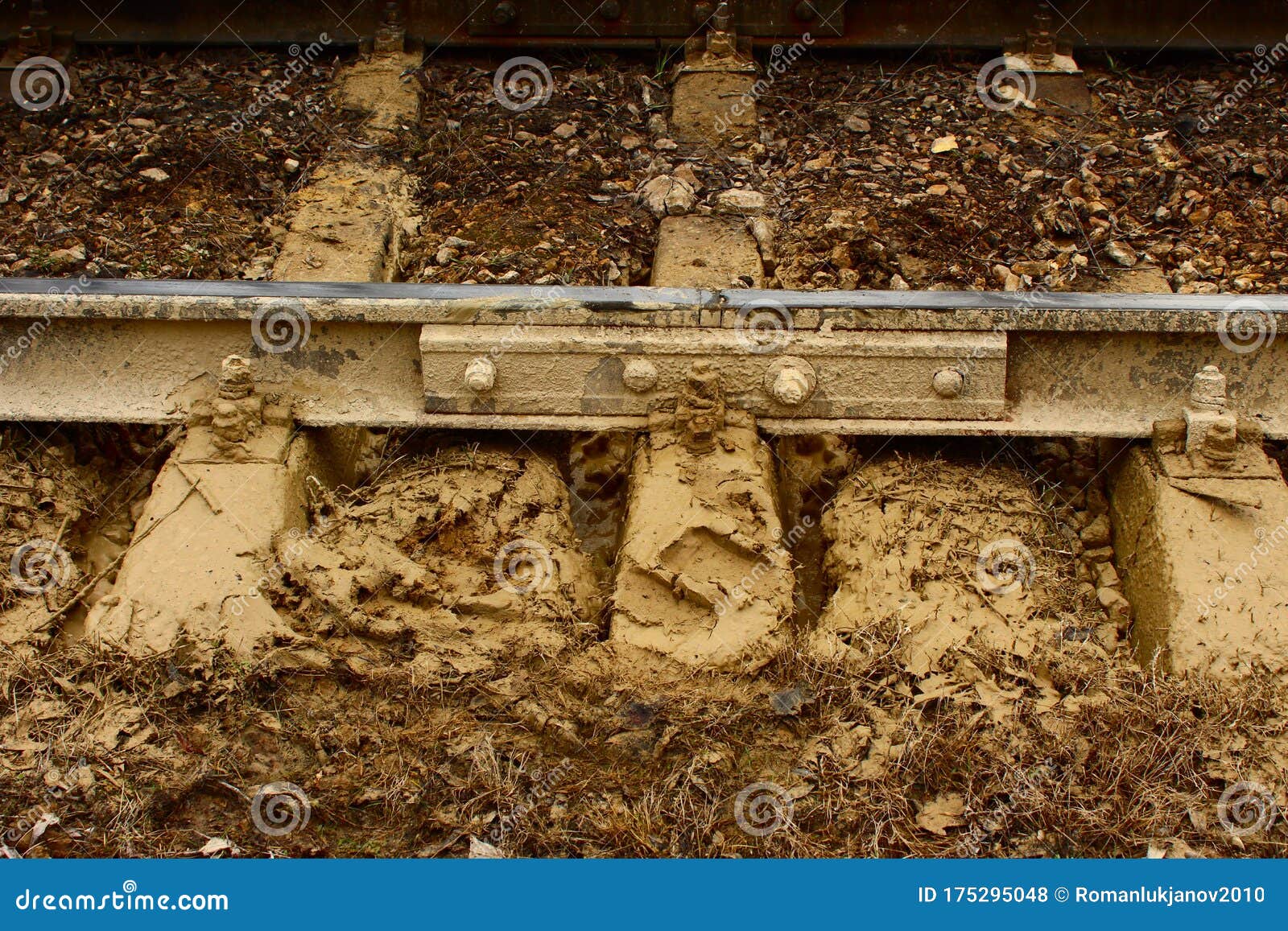 Railway track in the mud stock photo. Image of accident - 175295048