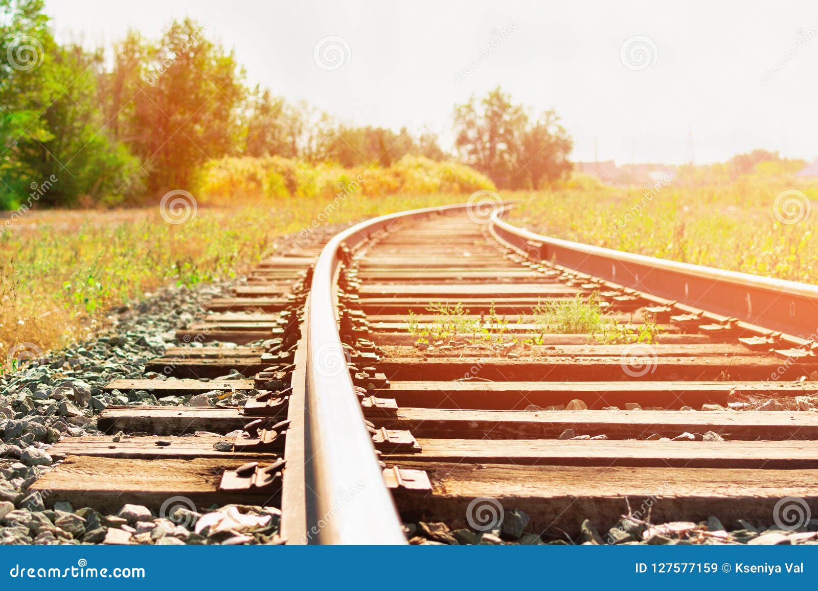 Railway track at sunset stock image. Image of rail, railroad - 127577159