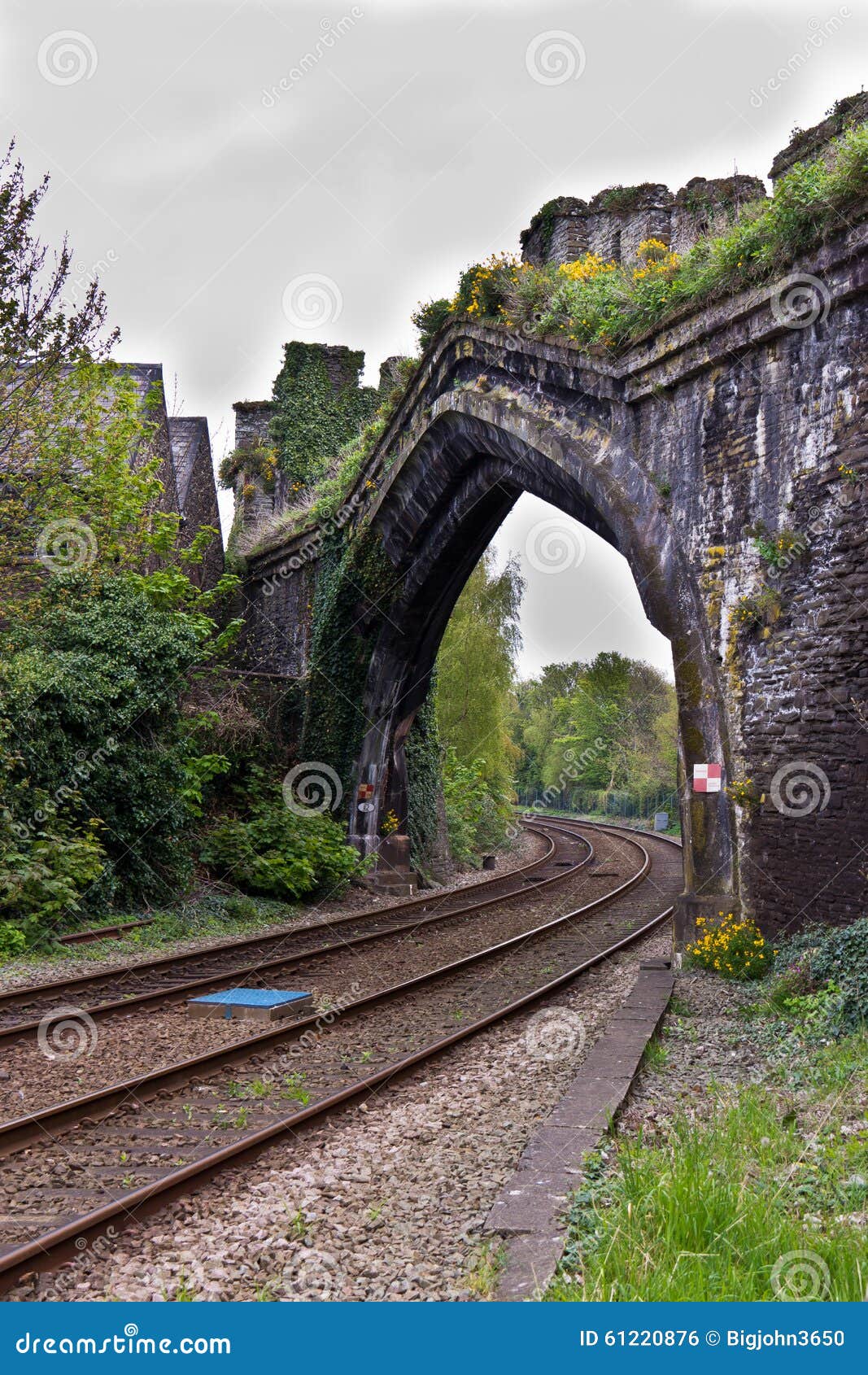 Railway Tracks Passing through Medieval Stone Wall in Conwy, Wal Stock ...