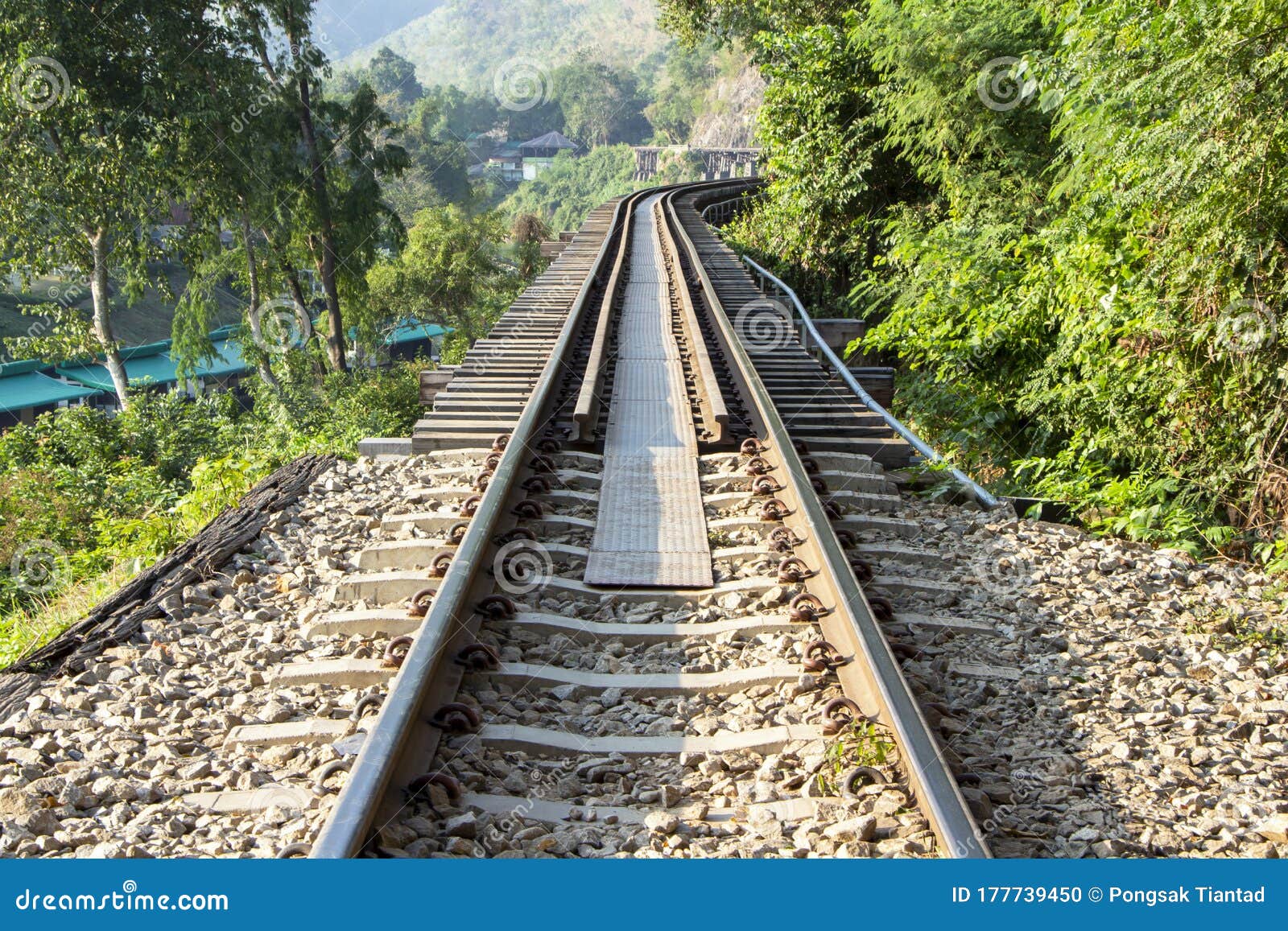 The Railway Tracks Slope Along Mountains and Forests in Asia Stock ...