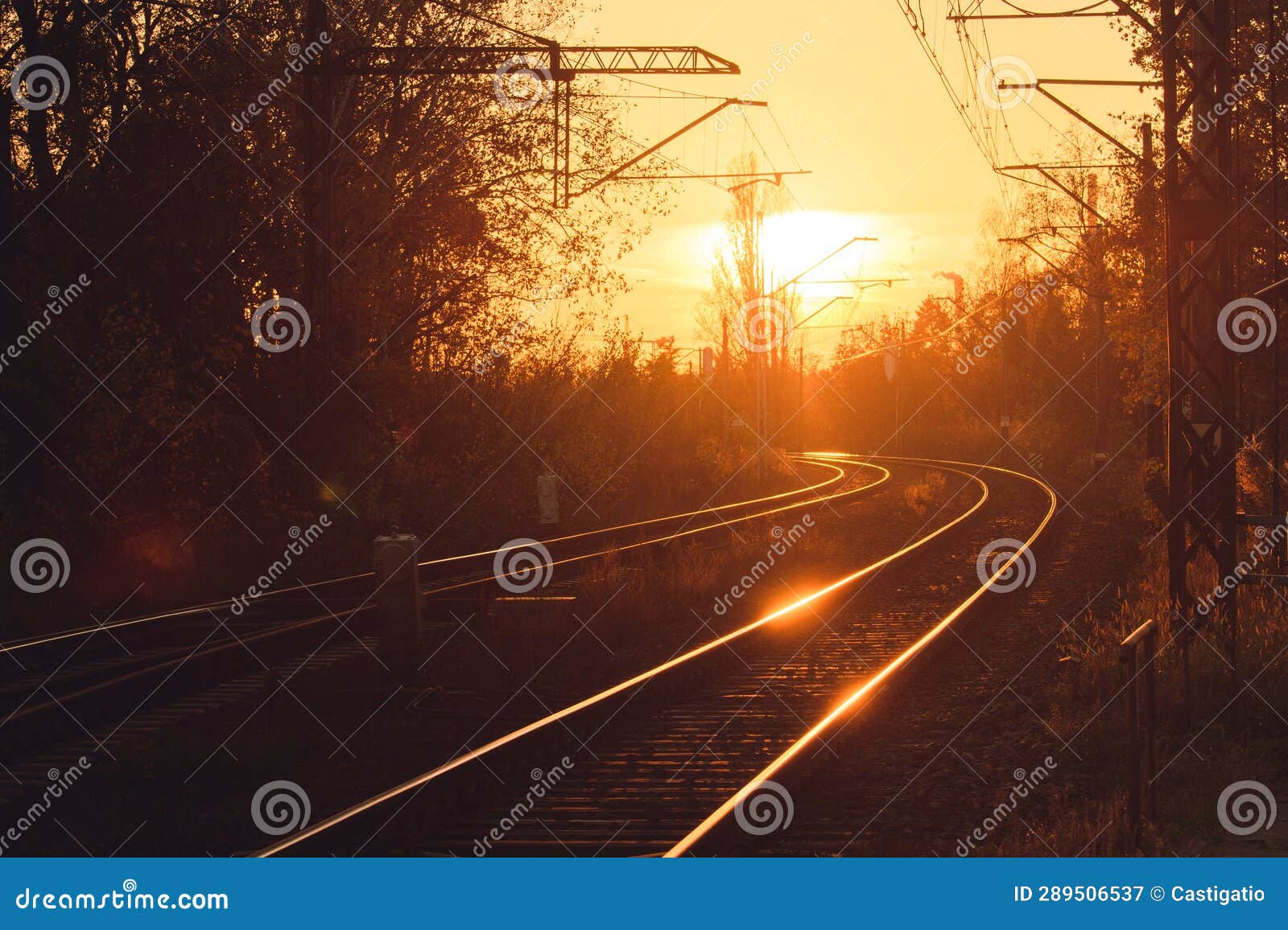 Railway Tracks at Sunset, the Route Leads Along the Trees Stock Image ...