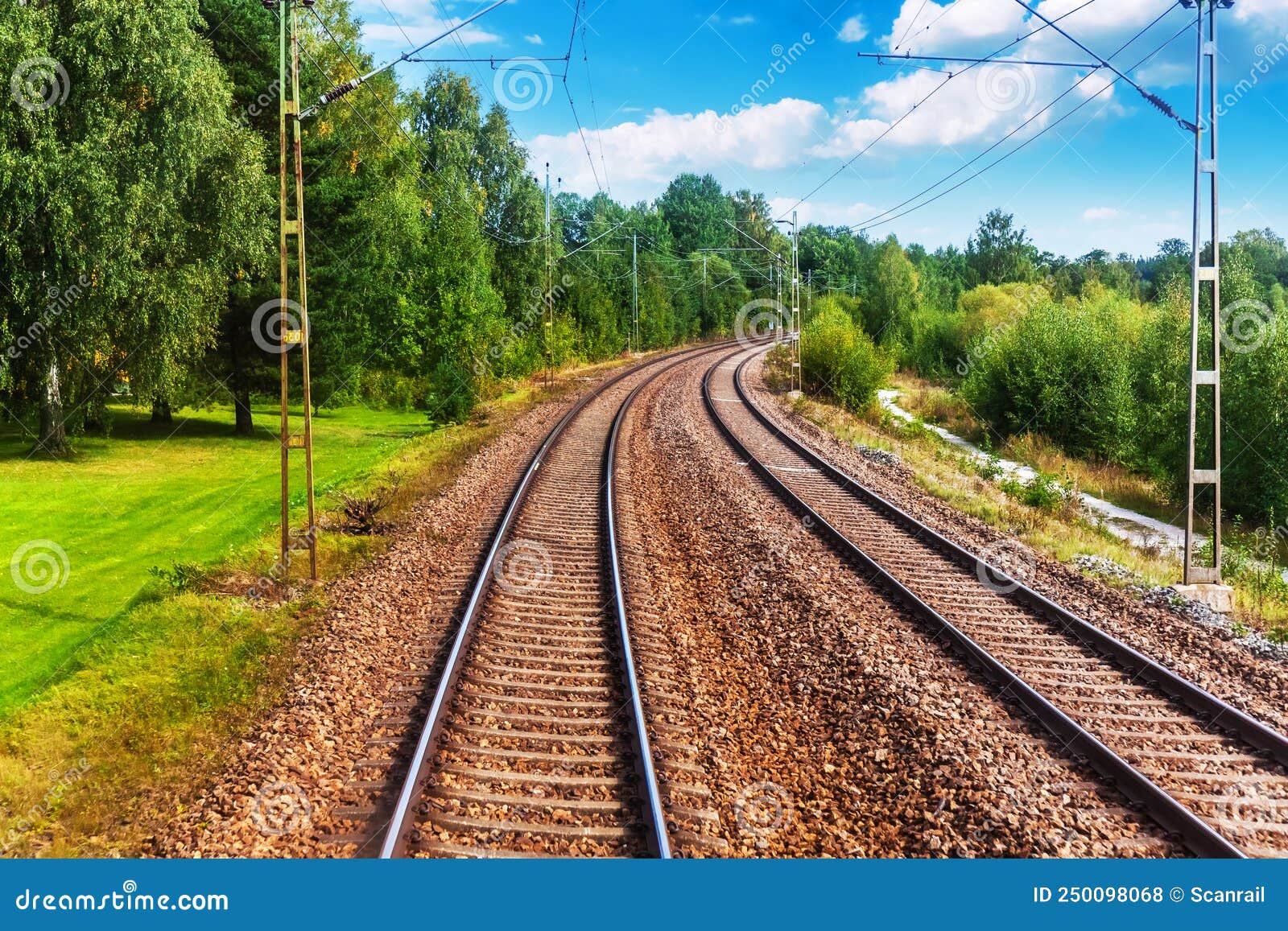 Railway Tracks with Catenary and Summer Landscape Stock Photo - Image ...