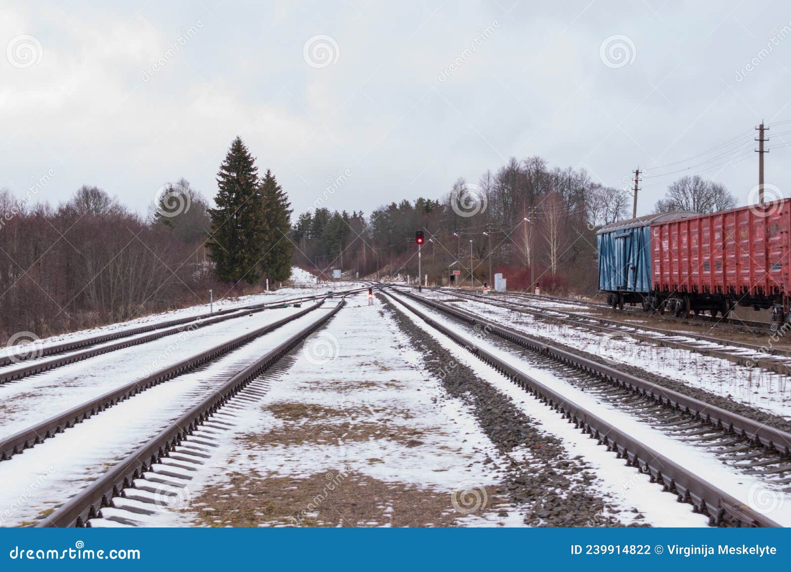 Railroad Tracks in Winter with a Train Stock Photo - Image of travel ...