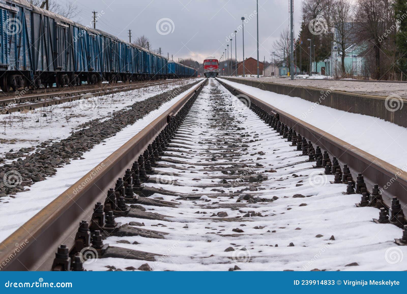 Railroad Tracks in Winter with a Train Stock Image - Image of track ...