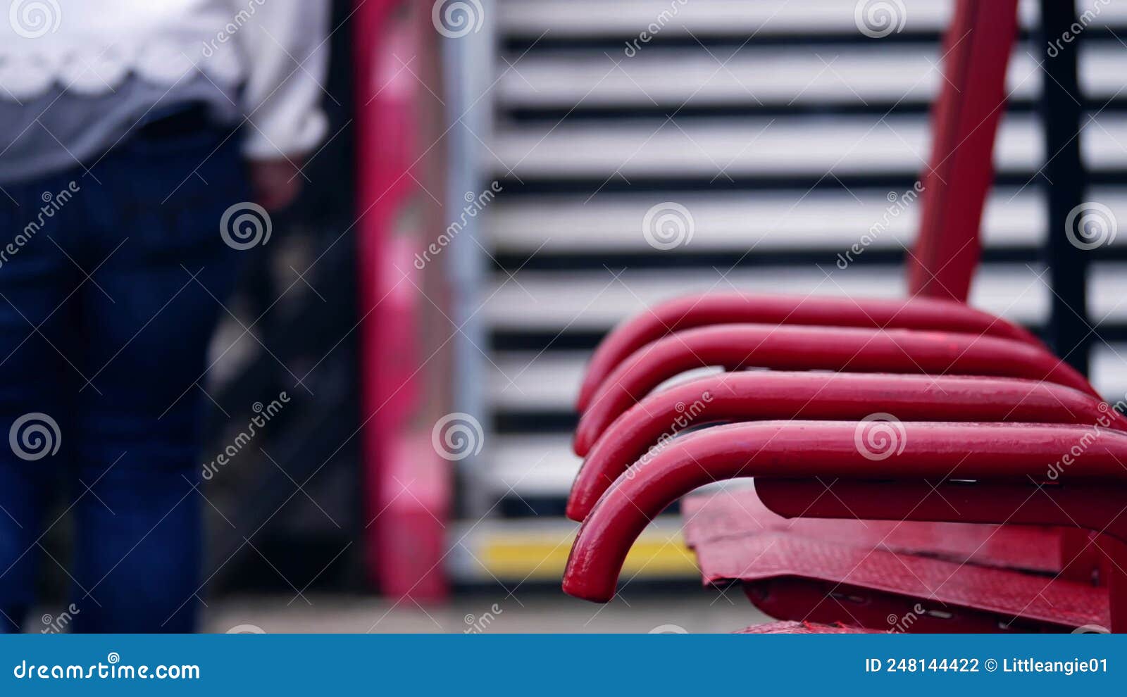 Railway Train Platform Benches with Commuter in Background Stock ...