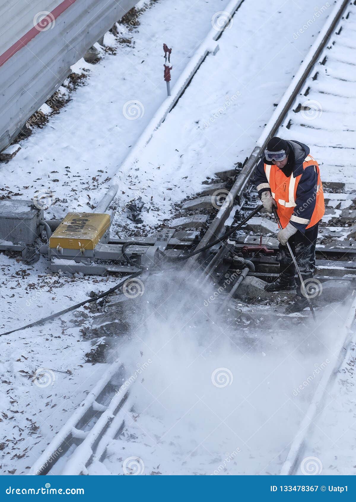 Railway Worker Cleans a Railway Track Editorial Photography - Image of ...