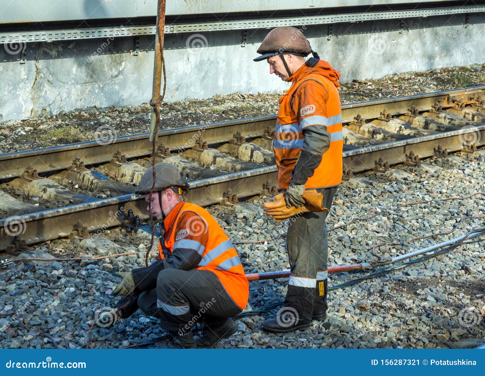 Railway Workers Connect Ground Wire Editorial Photo - Image of fitter ...