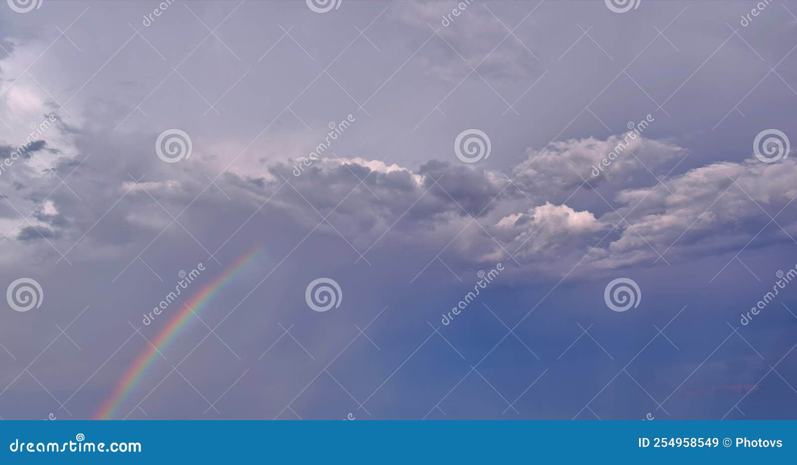 After Rain, a Beautiful Panorama Features a Multicolored Rainbow with ...