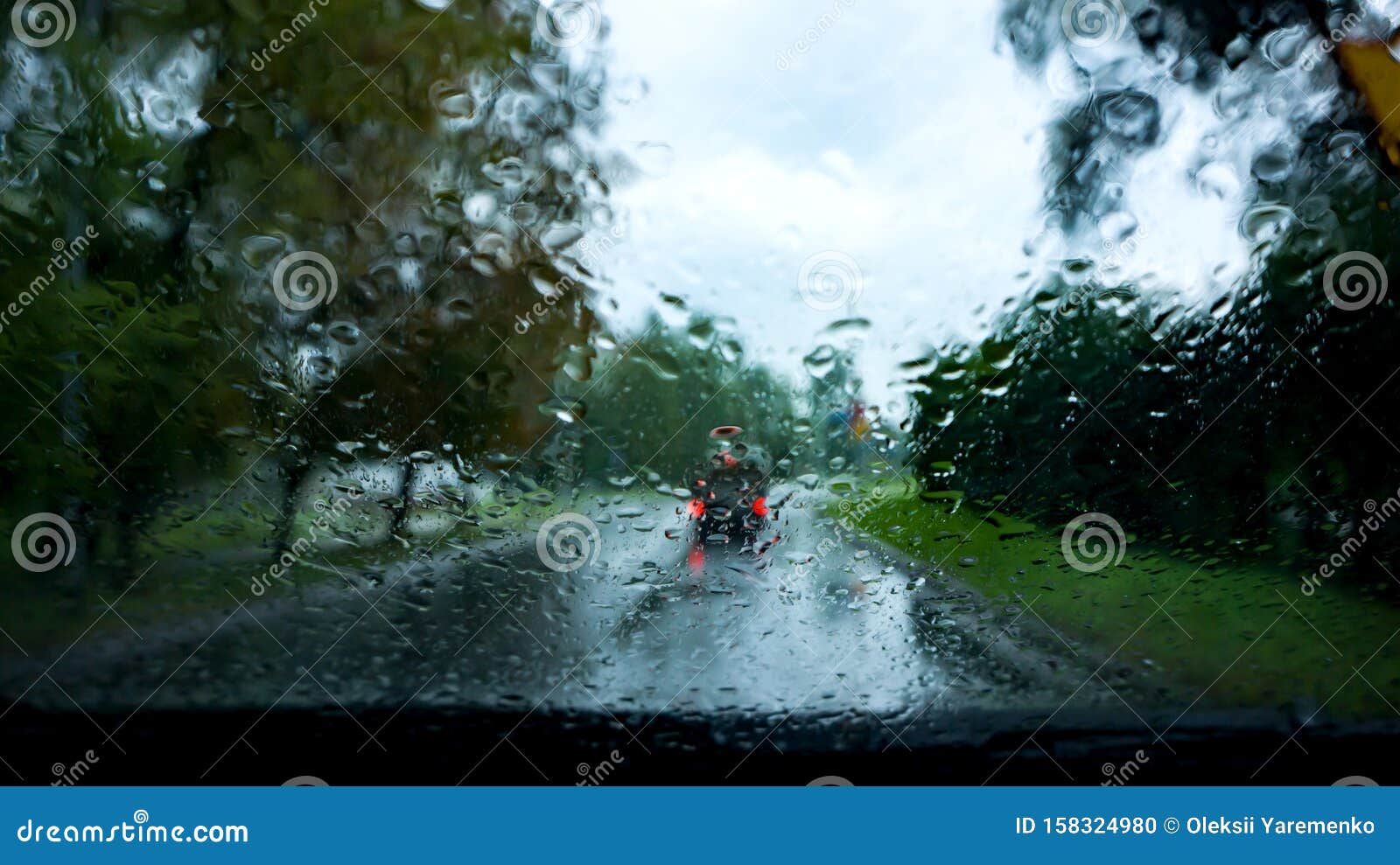 Rain on bus front window stock photo. Image of headlight - 158324980