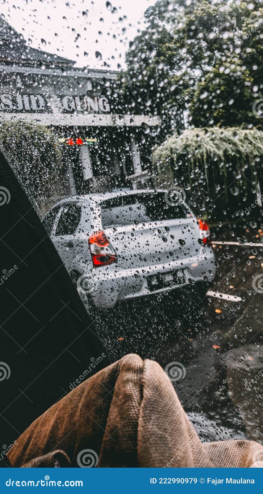 Rain in the car stock image. Image of darkgreen, rain - 222990979