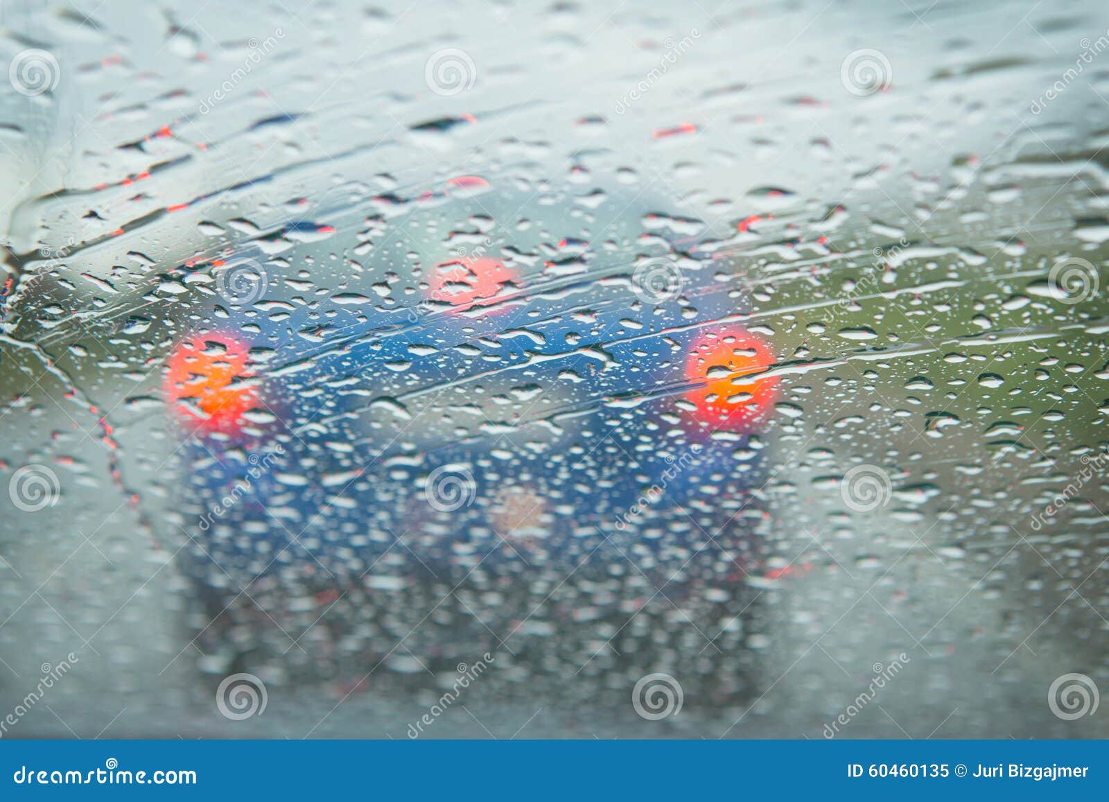 Rain on a car windshield stock image. Image of blue, inside - 60460135