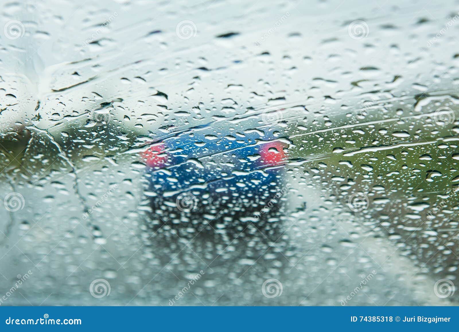 Rain on a car windshield stock photo. Image of assistance - 74385318